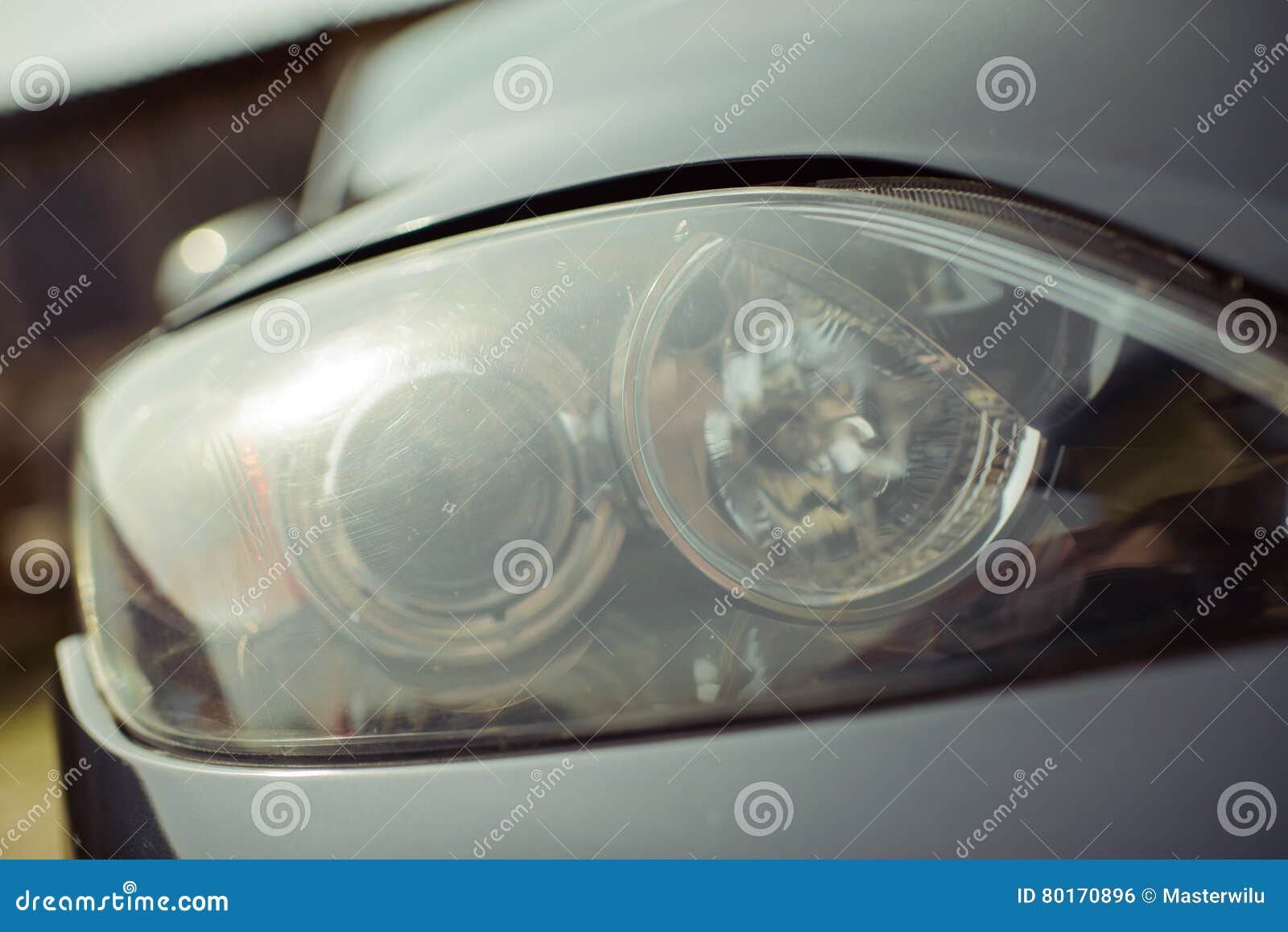Closeup of car headlight stock photo. Image of model - 80170896