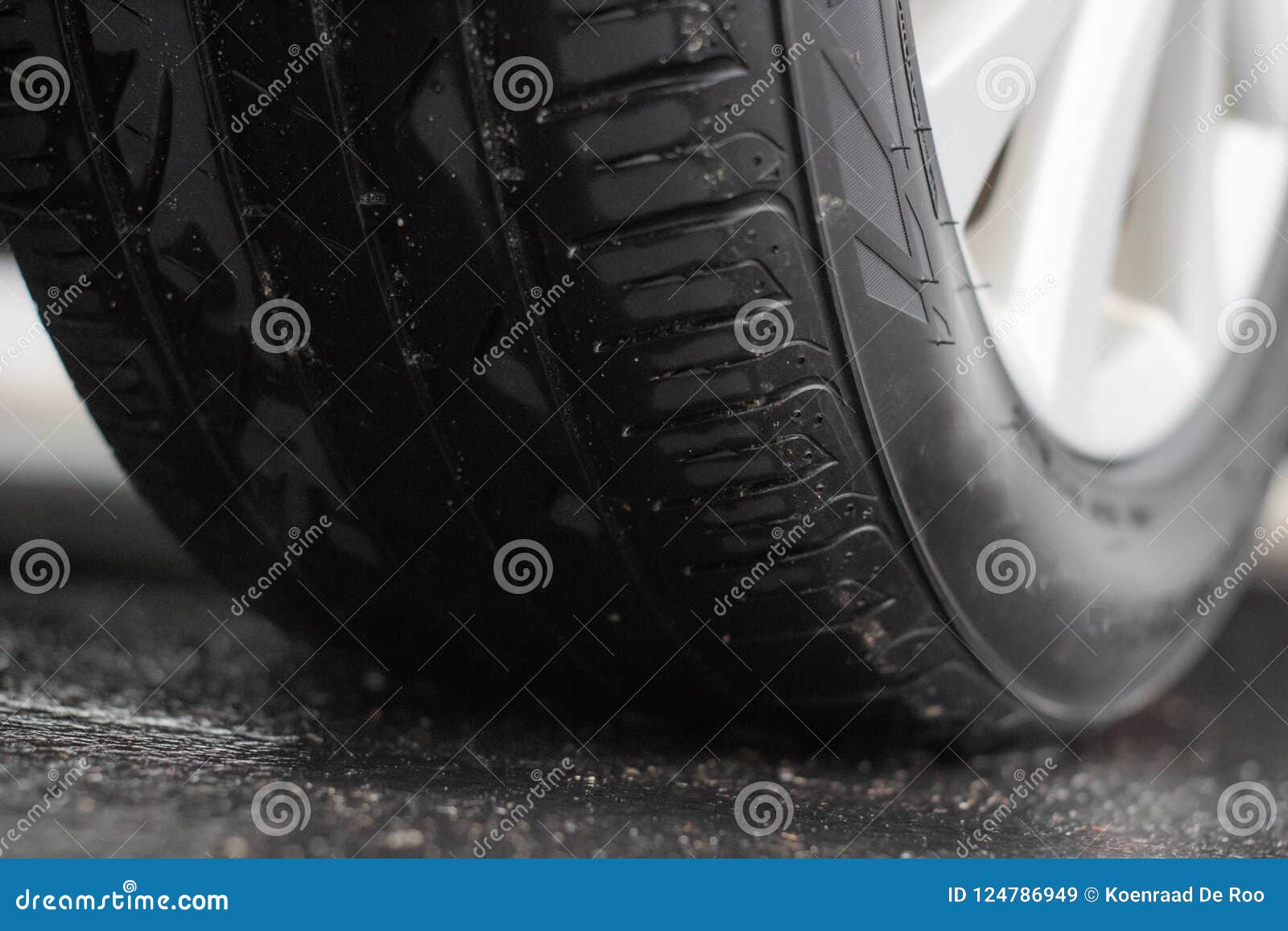 Closeup Car Tire Sitting on Wet Asphalt Stock Image - Image of close ...