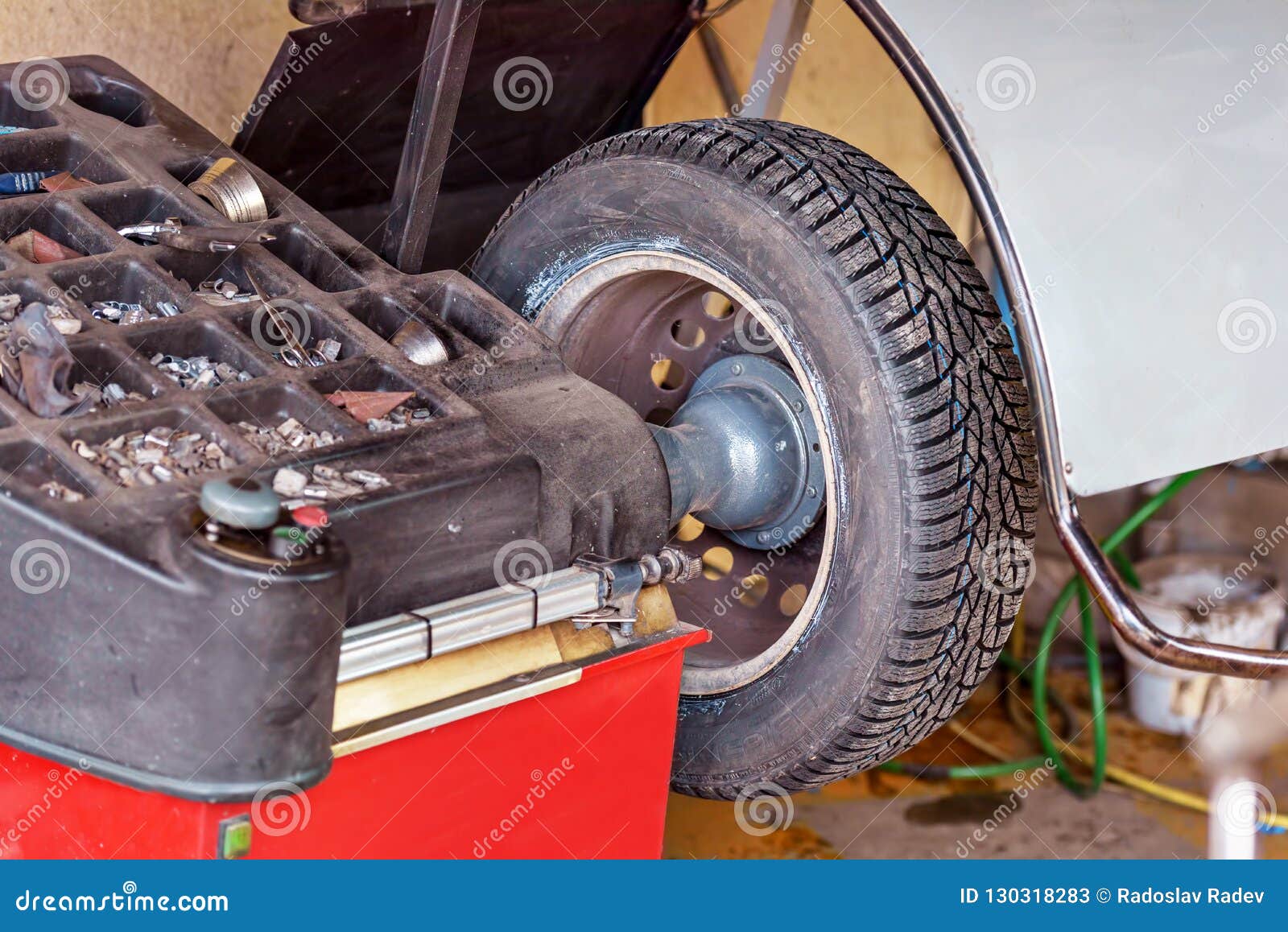 Closeup of Car Wheel Balancing in Tire Service. Stock Image - Image of ...