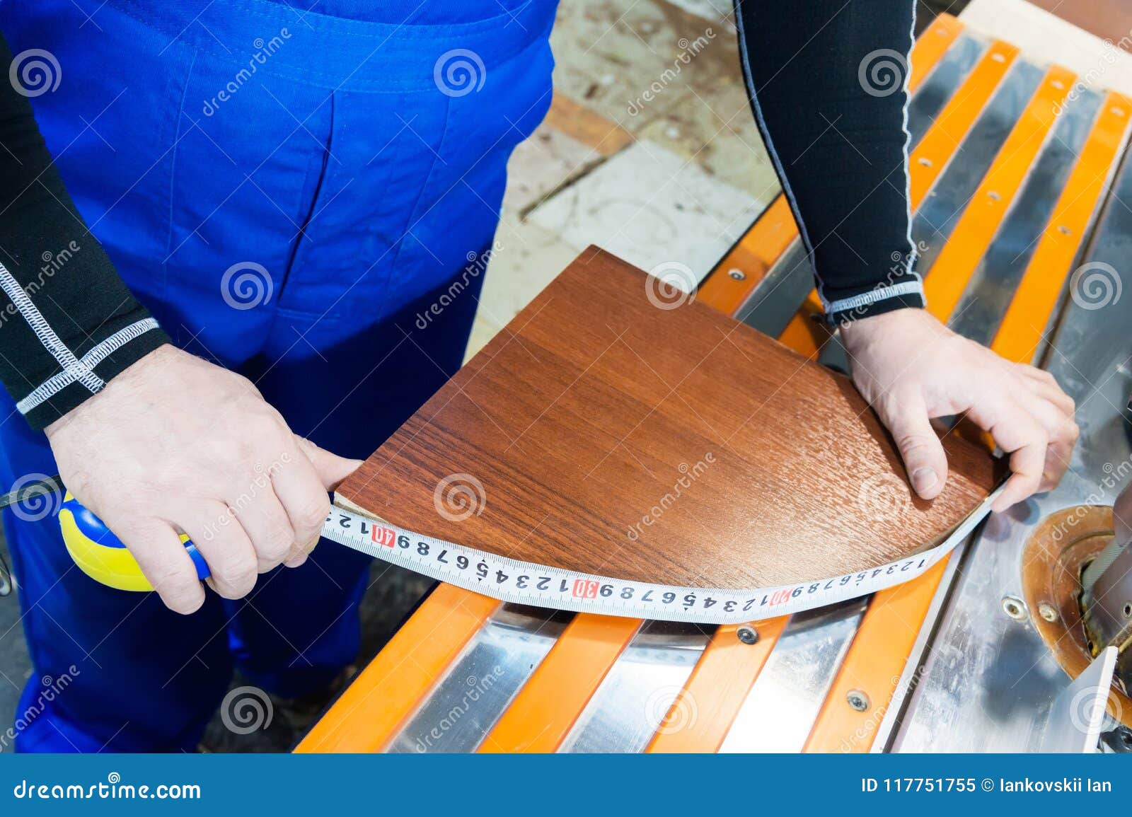 Closeup of Carpenter`s Hands Using One Meter in a Cottage Workshop ...