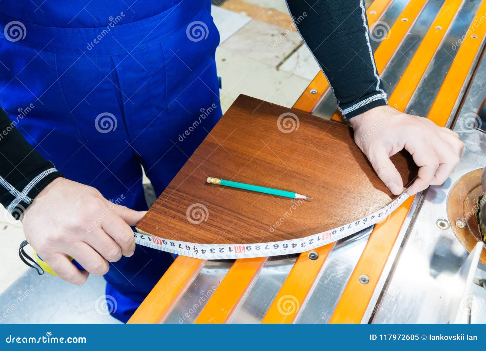 Closeup of Carpenter`s Hands Using One Meter in a Cottage Workshop ...