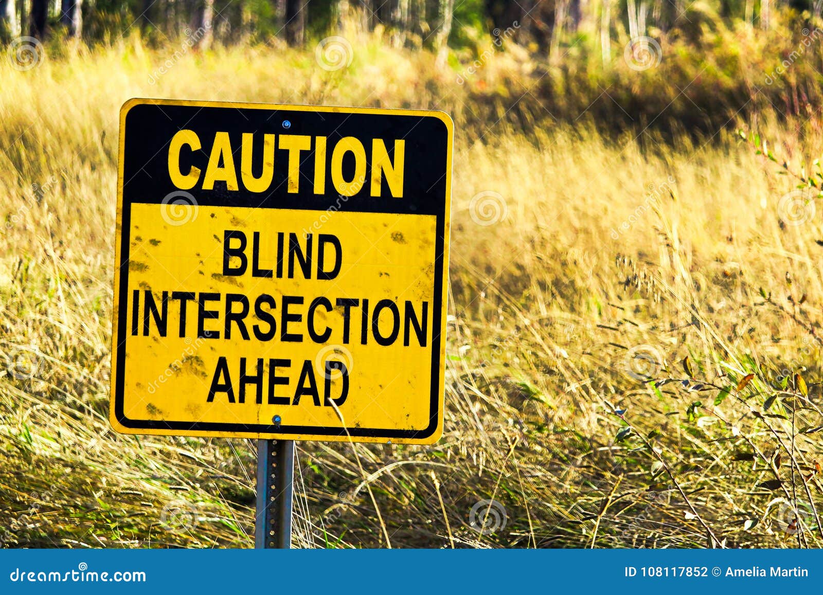 Closeup of a Caution Blind Intersection Ahead Sign Stock Photo - Image ...
