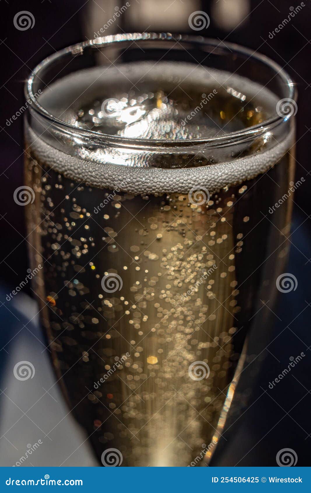 Closeup of a Champagne Glass with Bubbles, a Vertical Shot Stock Image ...