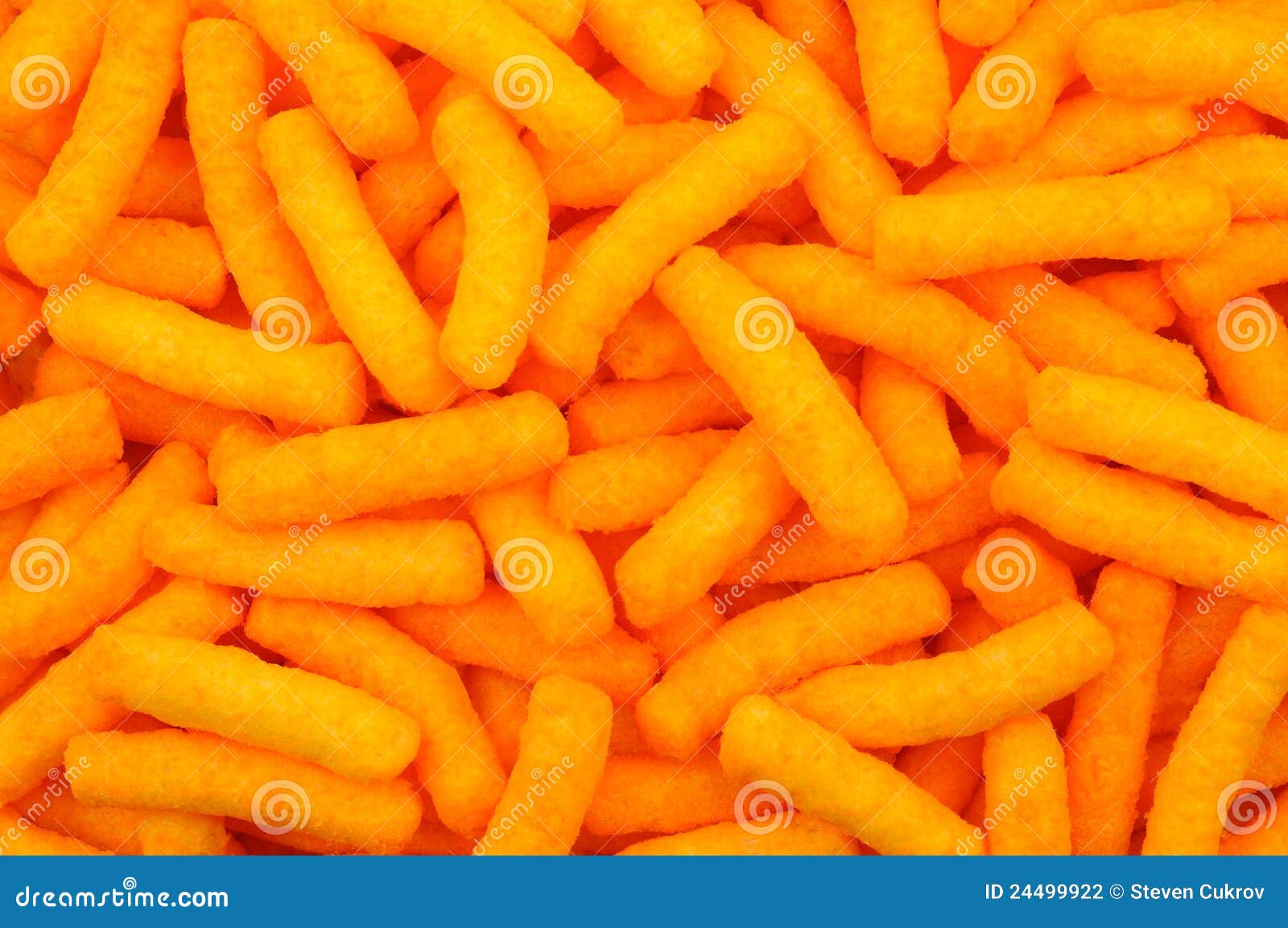 Closeup of Cheese Puffs stock photo. Image of crunchy - 24499922