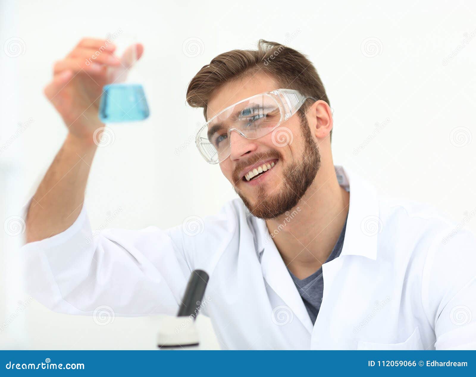 Closeup. Chemist Holding a Beaker with a Solution Stock Photo - Image ...