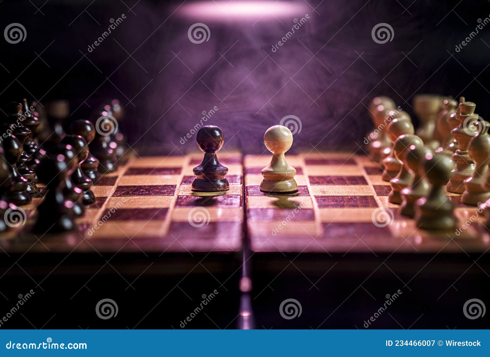 Closeup of Chess Pieces on the Chessboard Under the Lights with a ...