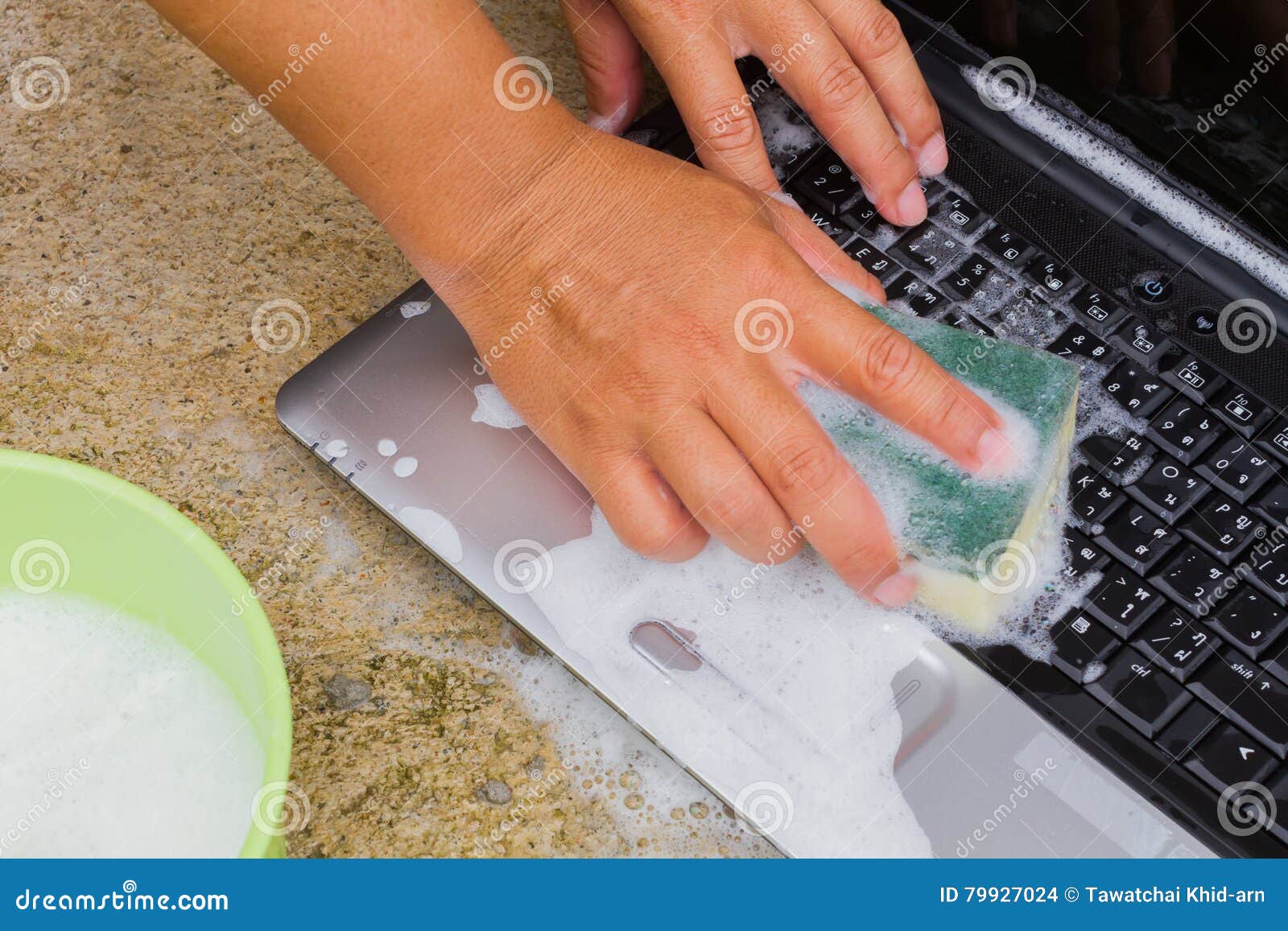 Closeup Cleaning Computer Notebook with Dish Washing Soap, Technology ...