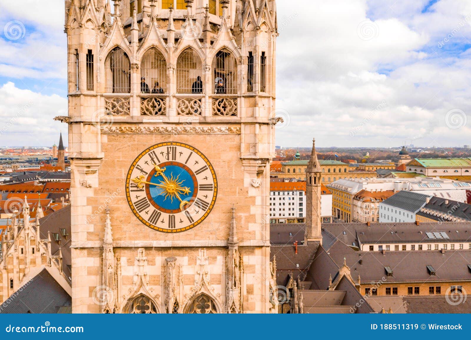 Closeup of the Clock on a Tower in Marienplatz Surrounded by Buildings ...