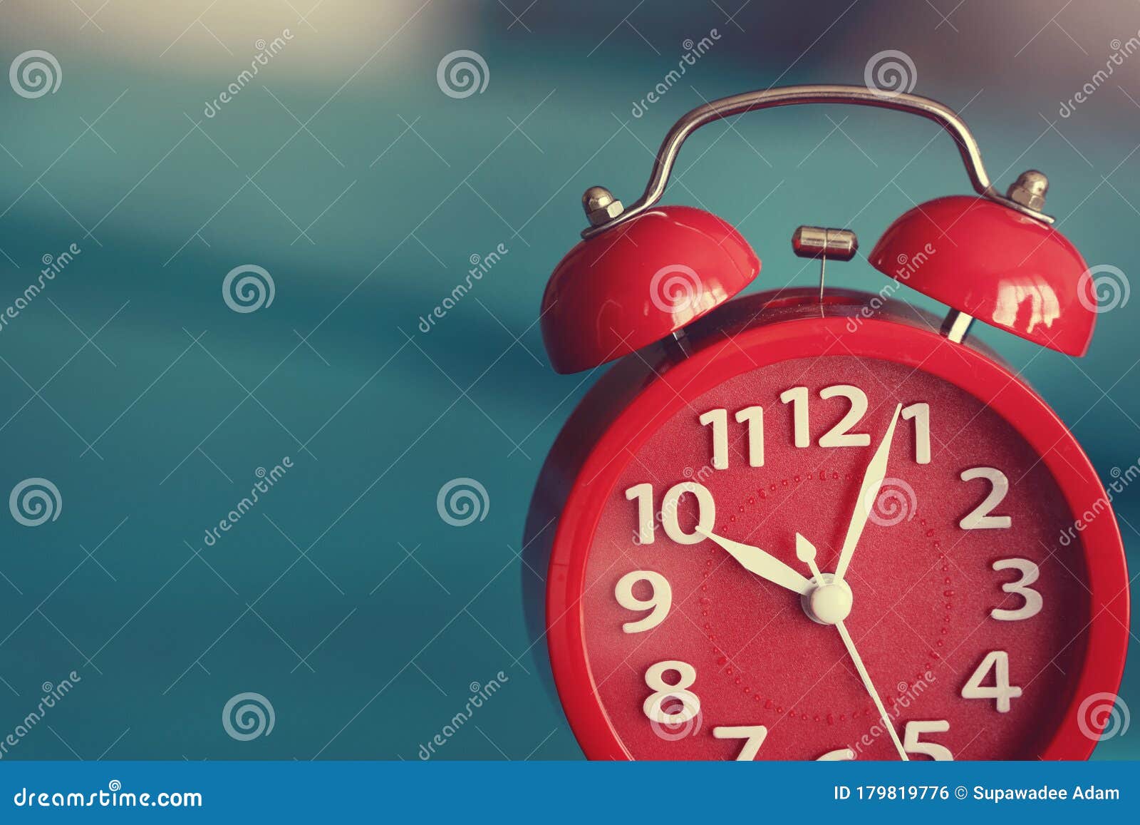 Closeup on Clockwise. Face of Red Alarm Clock at 10 O`clock Stock Photo ...