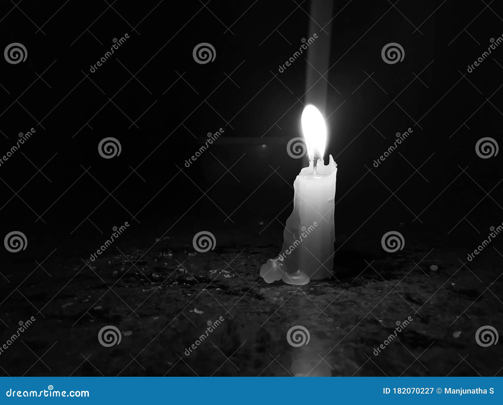 Color and Black & White Candle Light in a Dark Black Background Stock ...