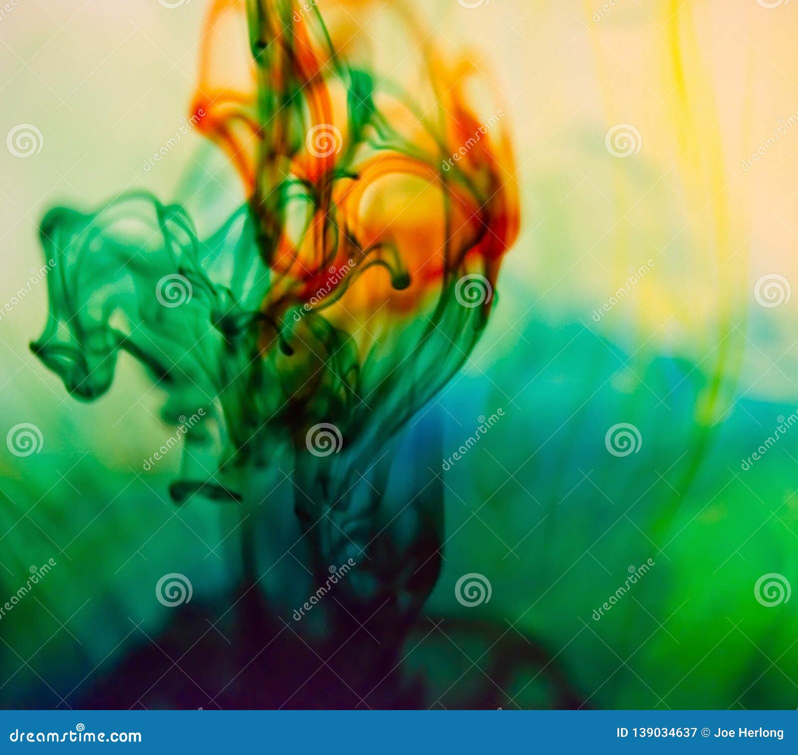 A Closeup of Colored Dyes Creating a Unique Pattern in Water. Stock ...