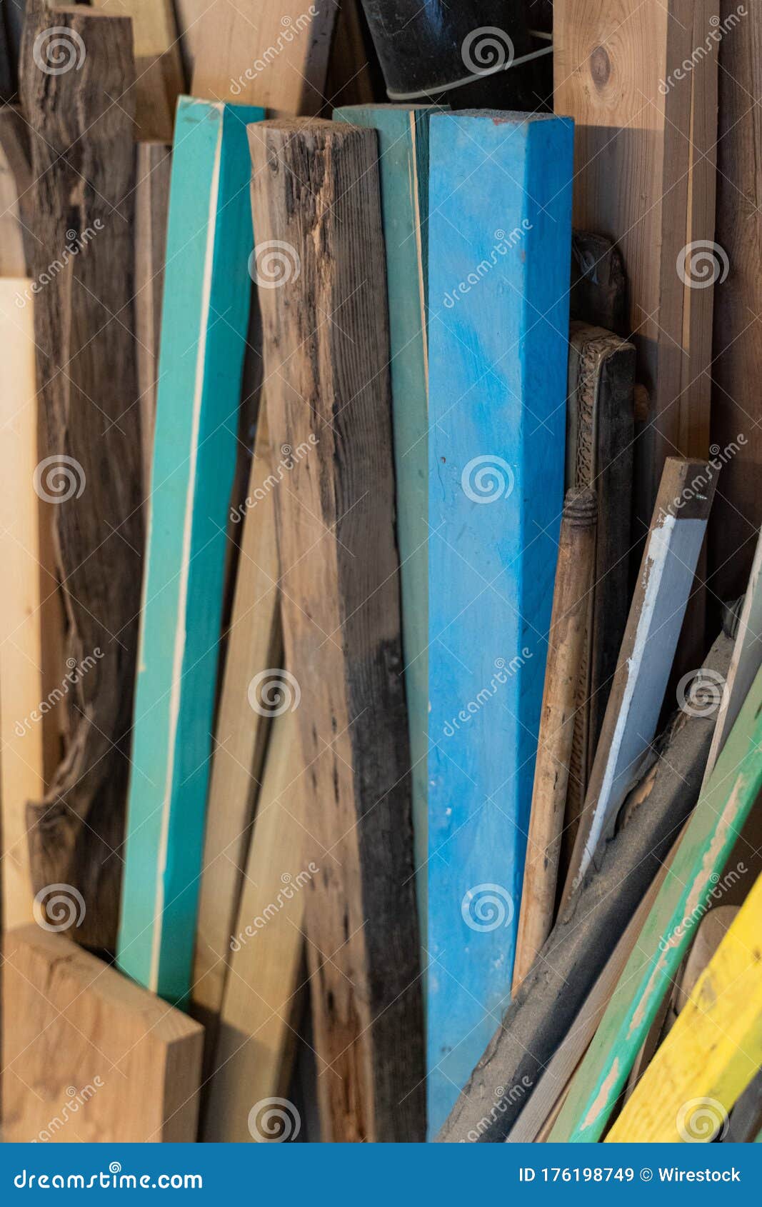 Closeup of Colorful Lumber Leaning on the Wall Under the Lights Stock ...