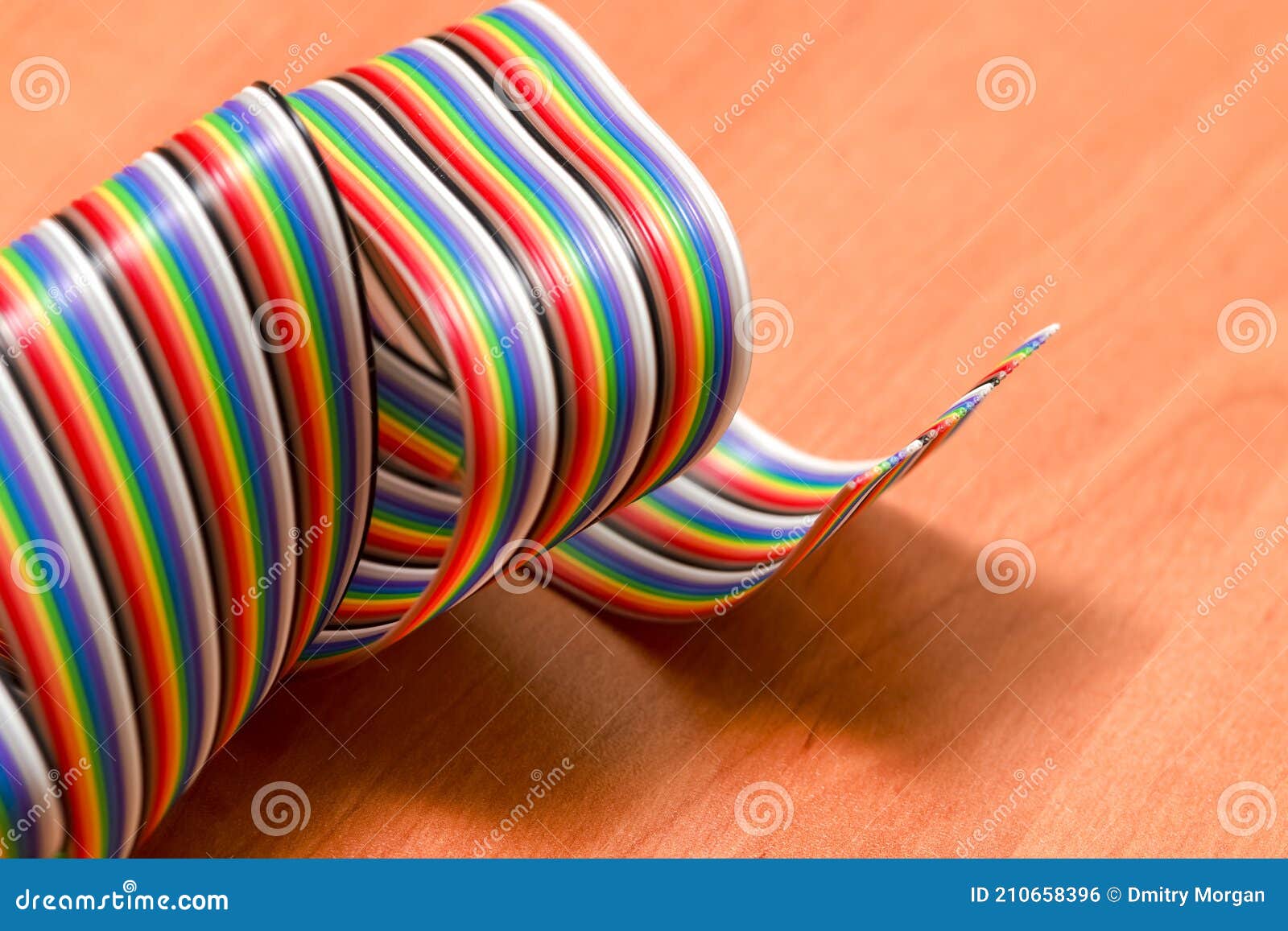 Closeup of Colorful Twisted Connecting Wire Strip on Plain Surface ...