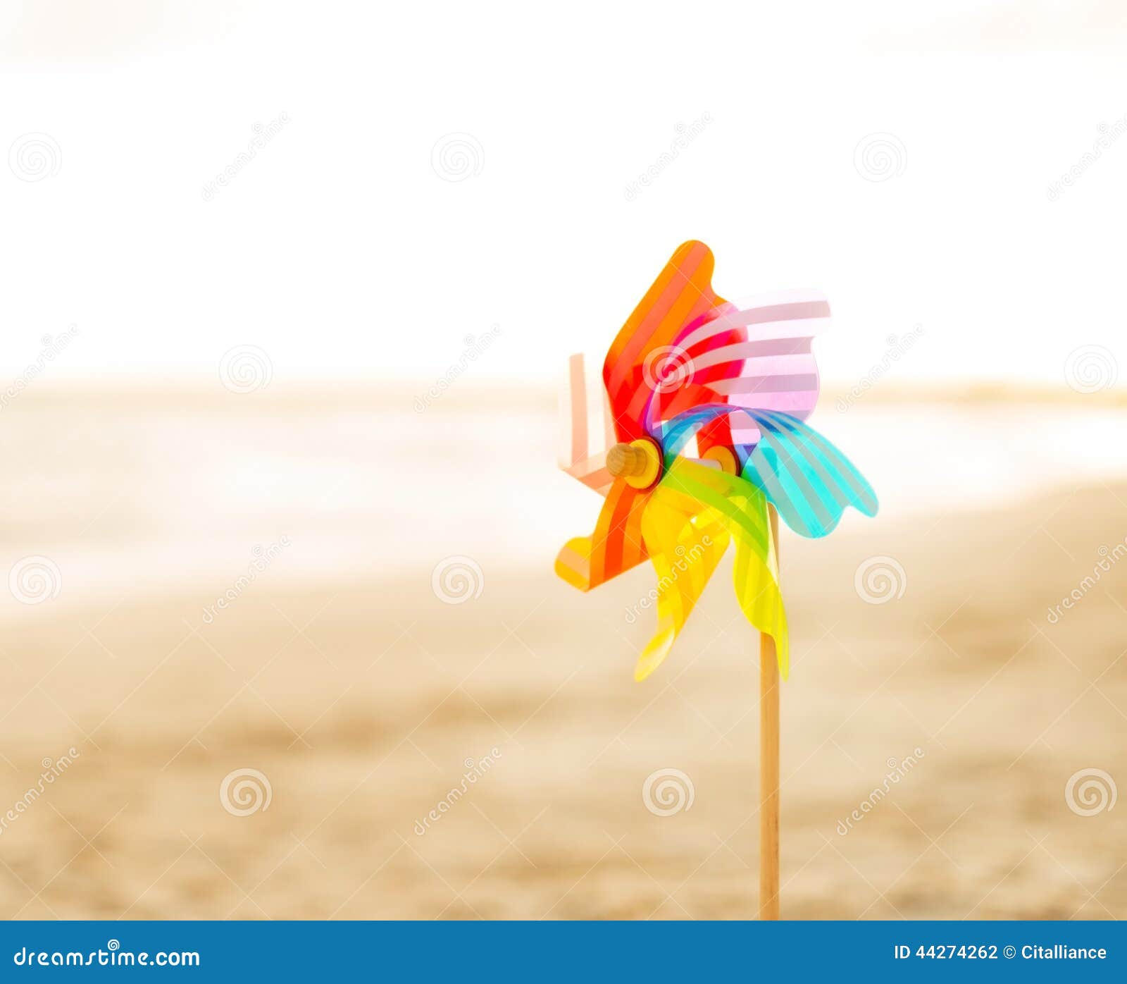 Closeup on Colorful Windmill Toy on the Beach Stock Photo - Image of ...