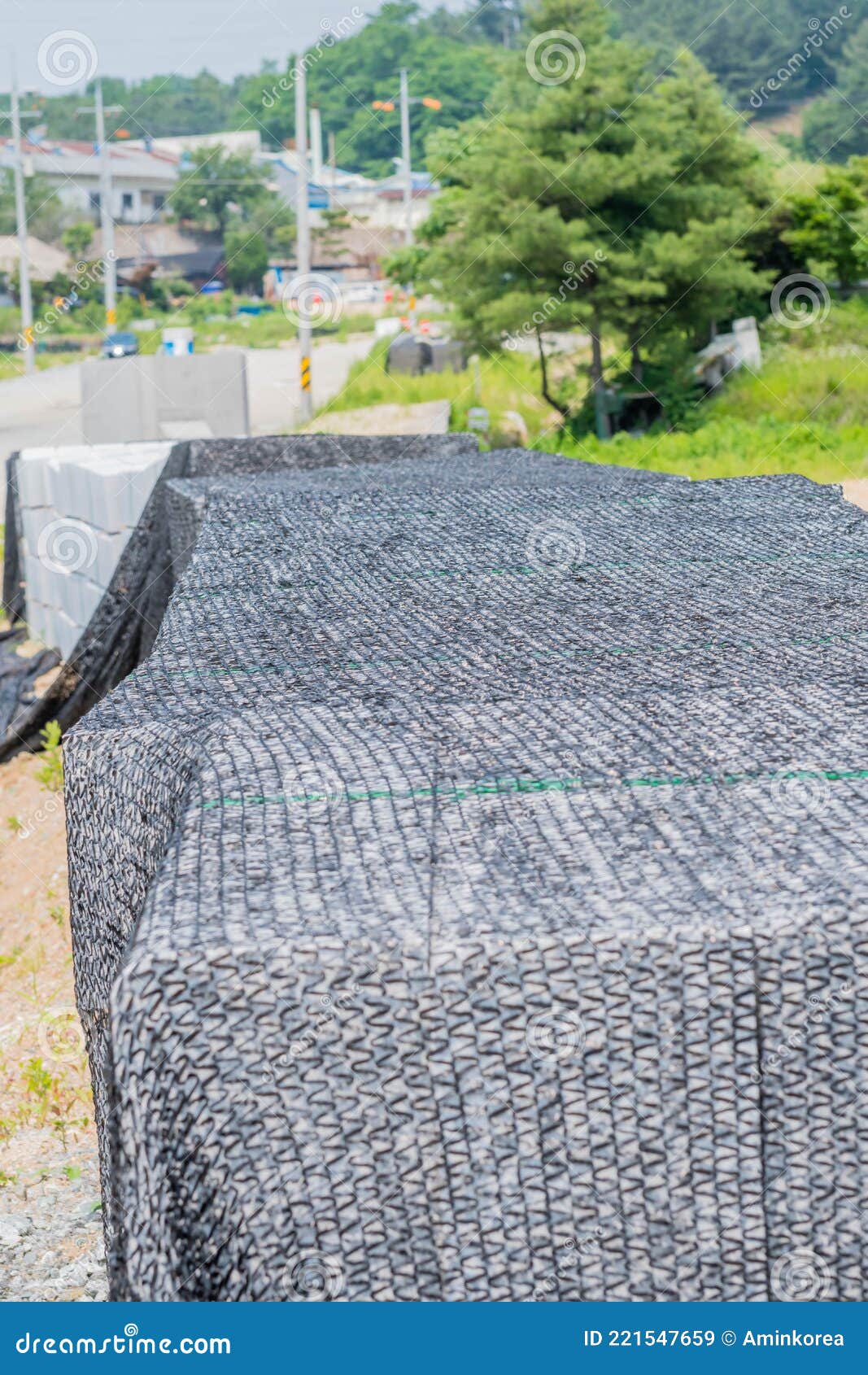 Closeup of Concrete Blocks Covered with Black Mesh Stock Image - Image ...