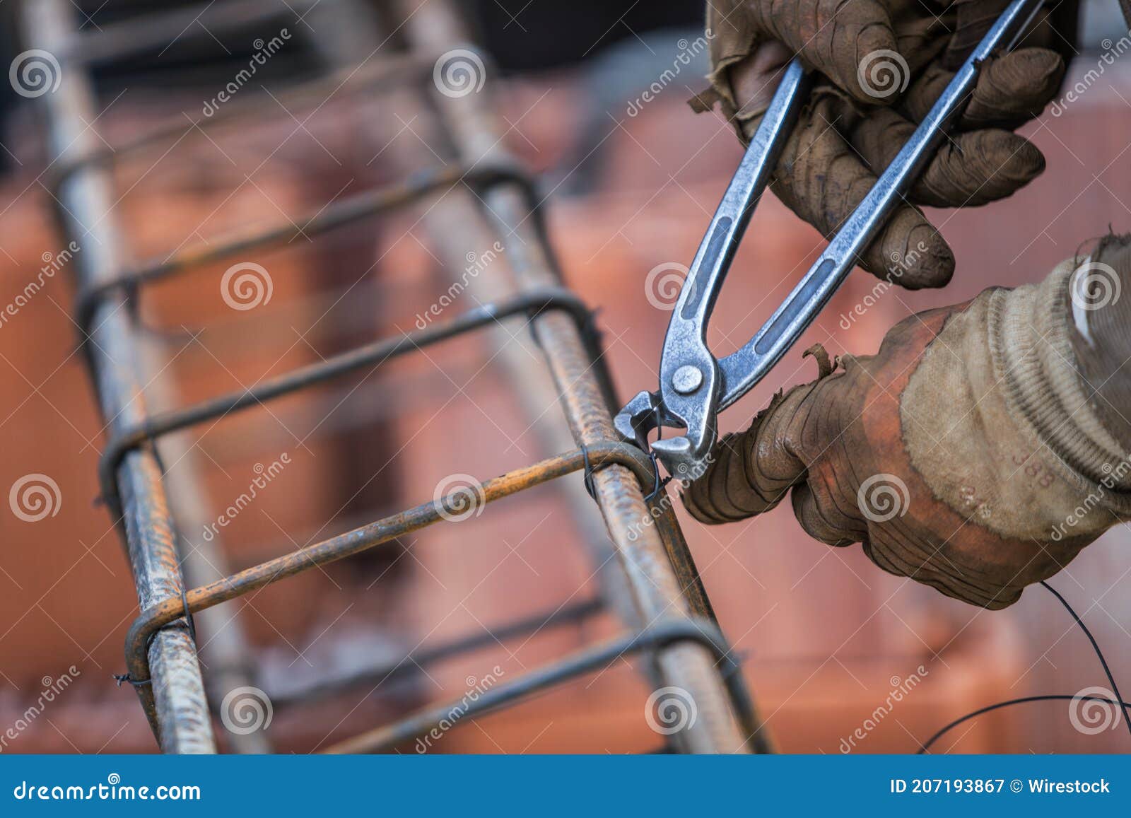Closeup of Construction Worker Hands Installing Binding Wires on the ...