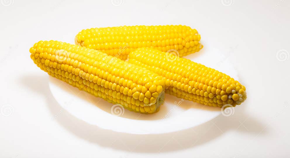 Closeup of Corn Kernels on Plate Isolated Stock Photo - Image of ...
