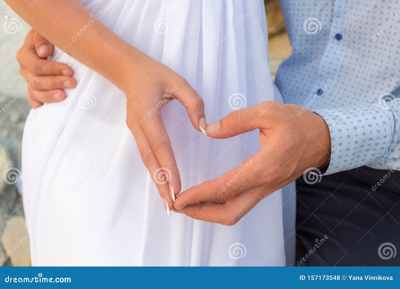 Closeup of Couple Making Heart Shape with Hands Stock Photo - Image of ...