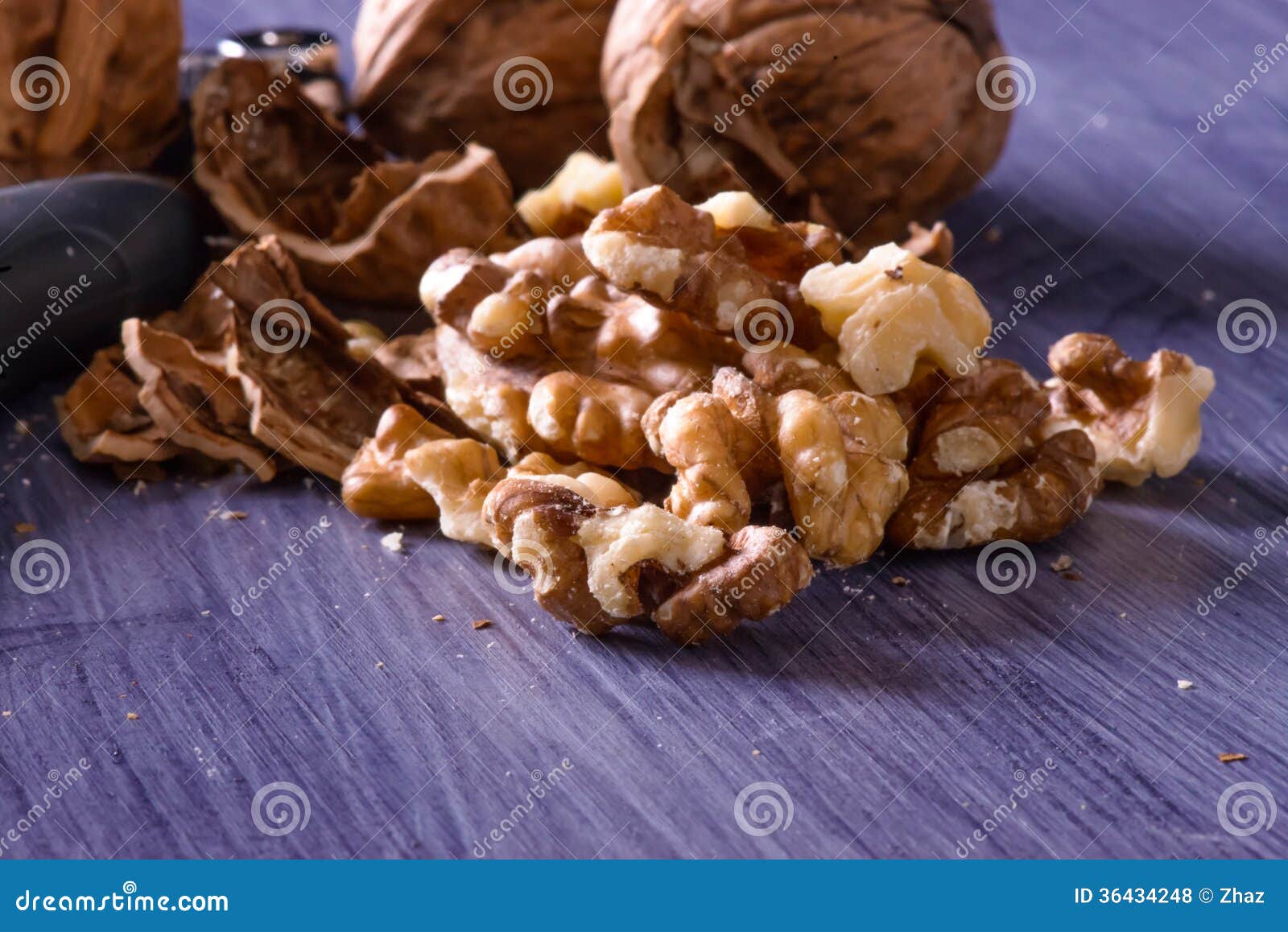 Closeup of cracked walnuts stock photo. Image of food - 36434248