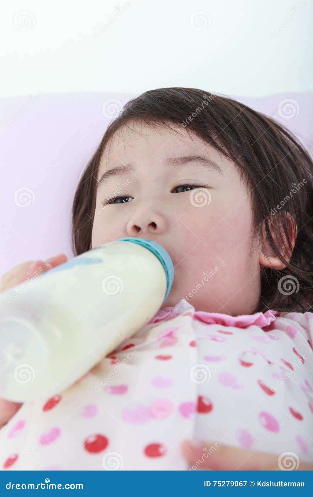 Closeup Cute Asian Girl Suck Up Milk Bottle Drinking Milk For G Stock