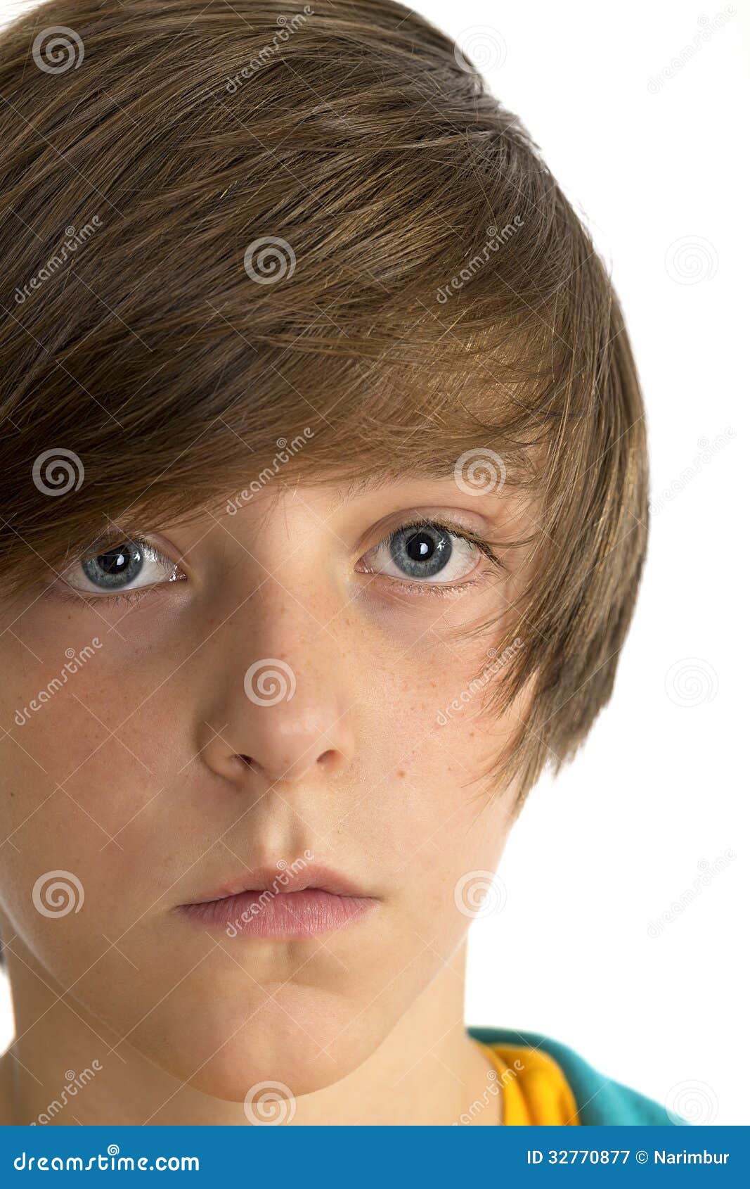 Closeup of a Cute Teenage Boy Looking into the Camera Stock Image ...