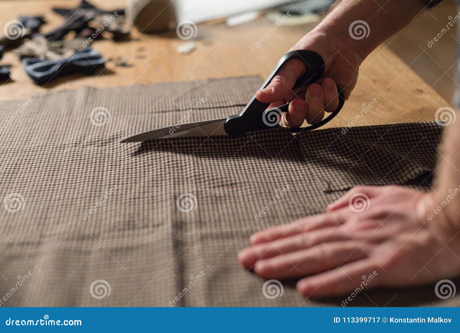 Closeup Cutting Brown Plaid Wool Fabric. the Line Pattern. Young Man ...