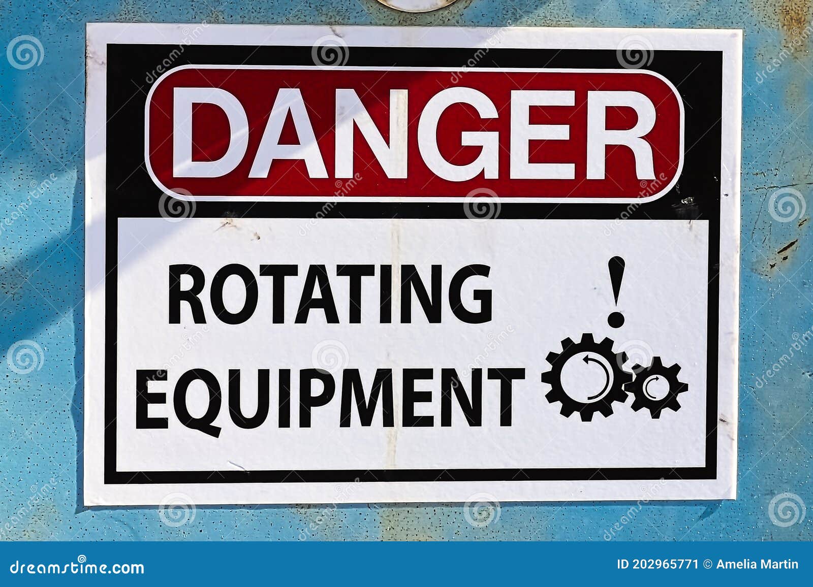 Closeup of a Danger Rotating Equipment Sign Stock Image - Image of ...
