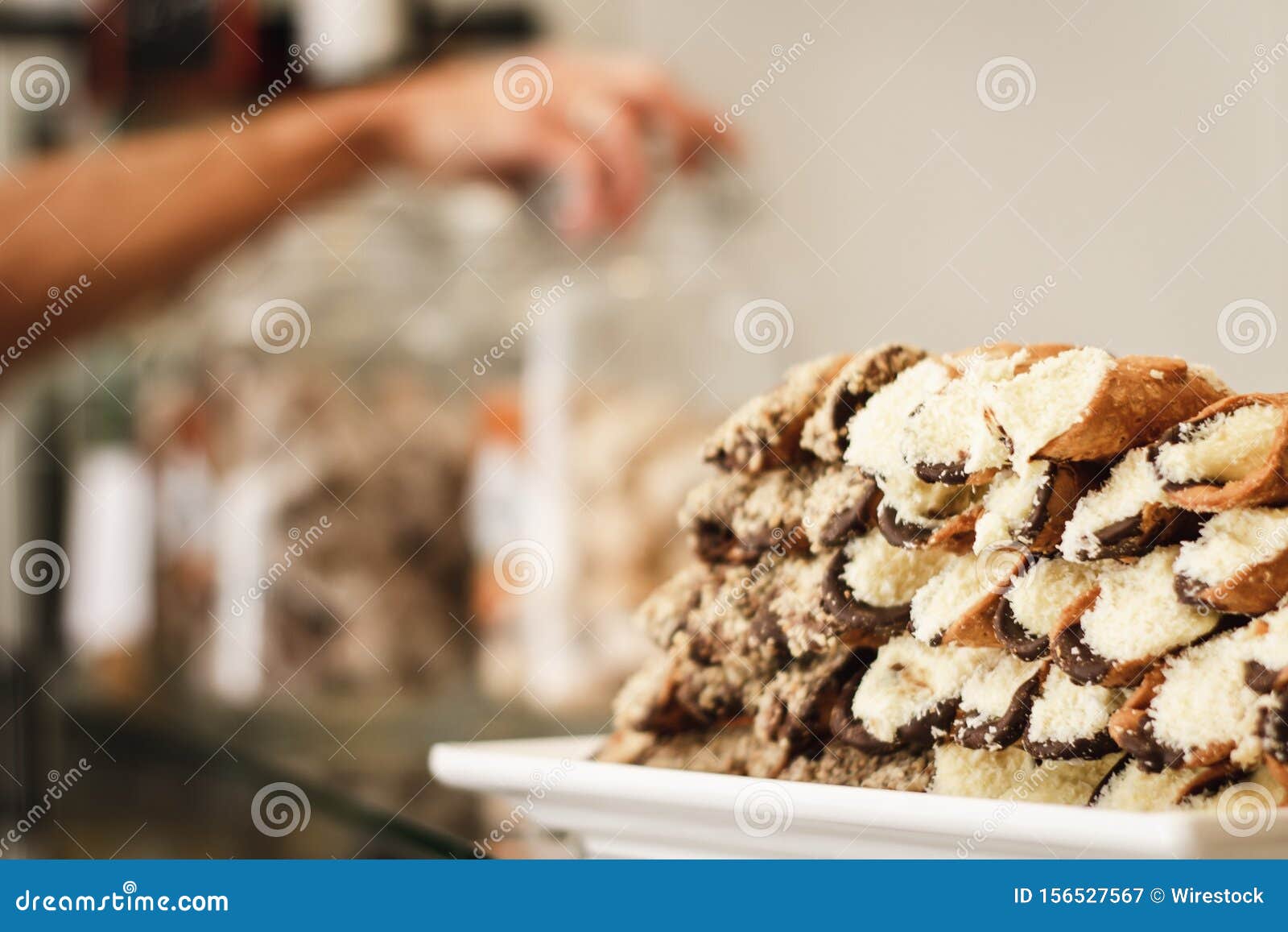 Closeup of a Dessert Canoles on a White Tray with a Blurred Background ...