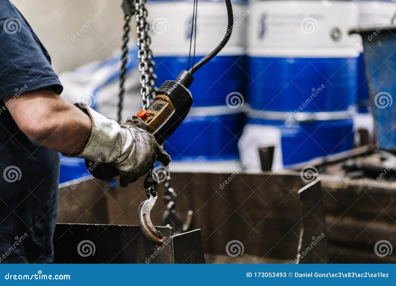 Detail of the Hands of a Crane Operator Man Operating the Command in a ...