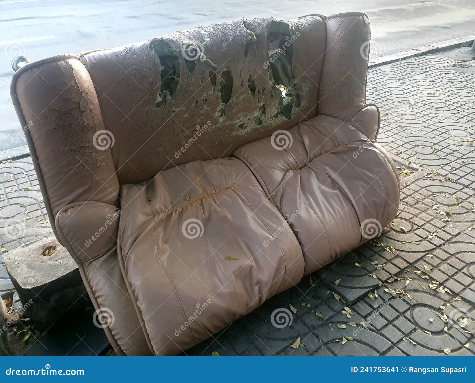 Dirty Old Colorful Sofa is Left with Garbage on the Side of the Road ...
