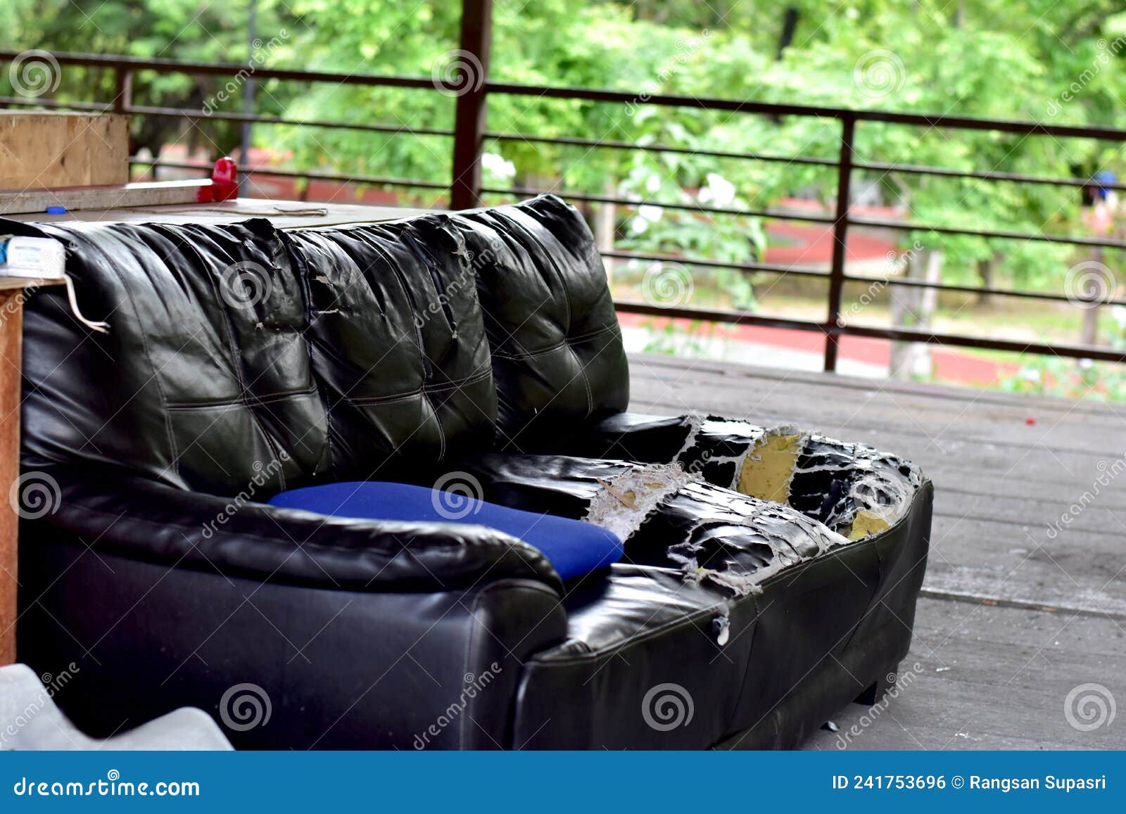 Dirty Old Colorful Sofa is Left with Garbage on the Side of the Road ...