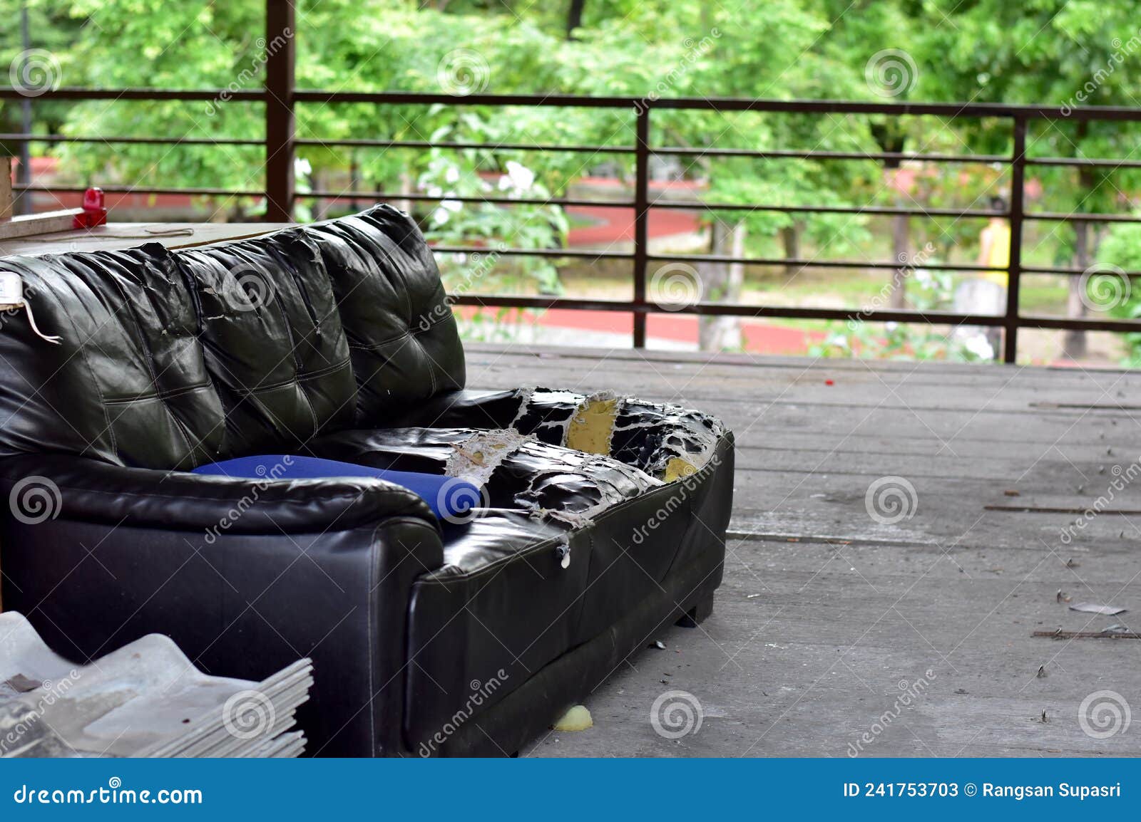 Dirty Old Colorful Sofa is Left with Garbage on the Side of the Road ...