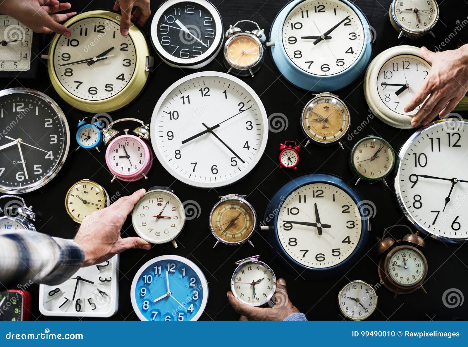 Closeup of Diverse Clocks on Black Background Stock Photo - Image of ...