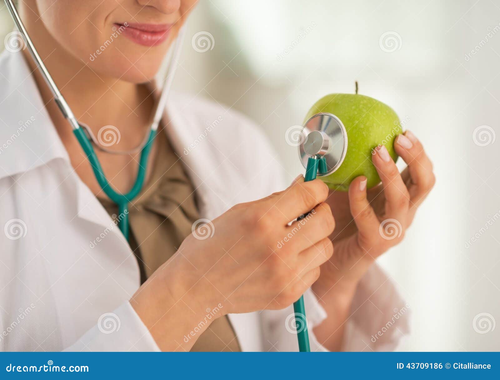 Closeup on Doctor Using Stethoscope on Apple Stock Photo - Image of ...