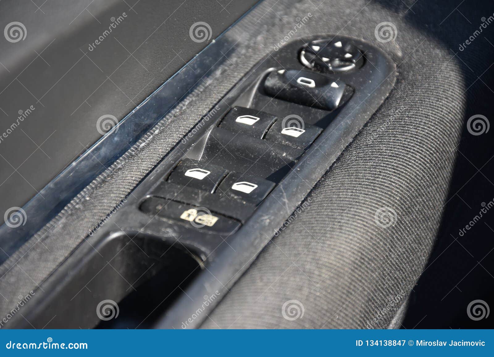 Closeup of a Door Control Panel in a Modern Car. Arm Rest with Window ...