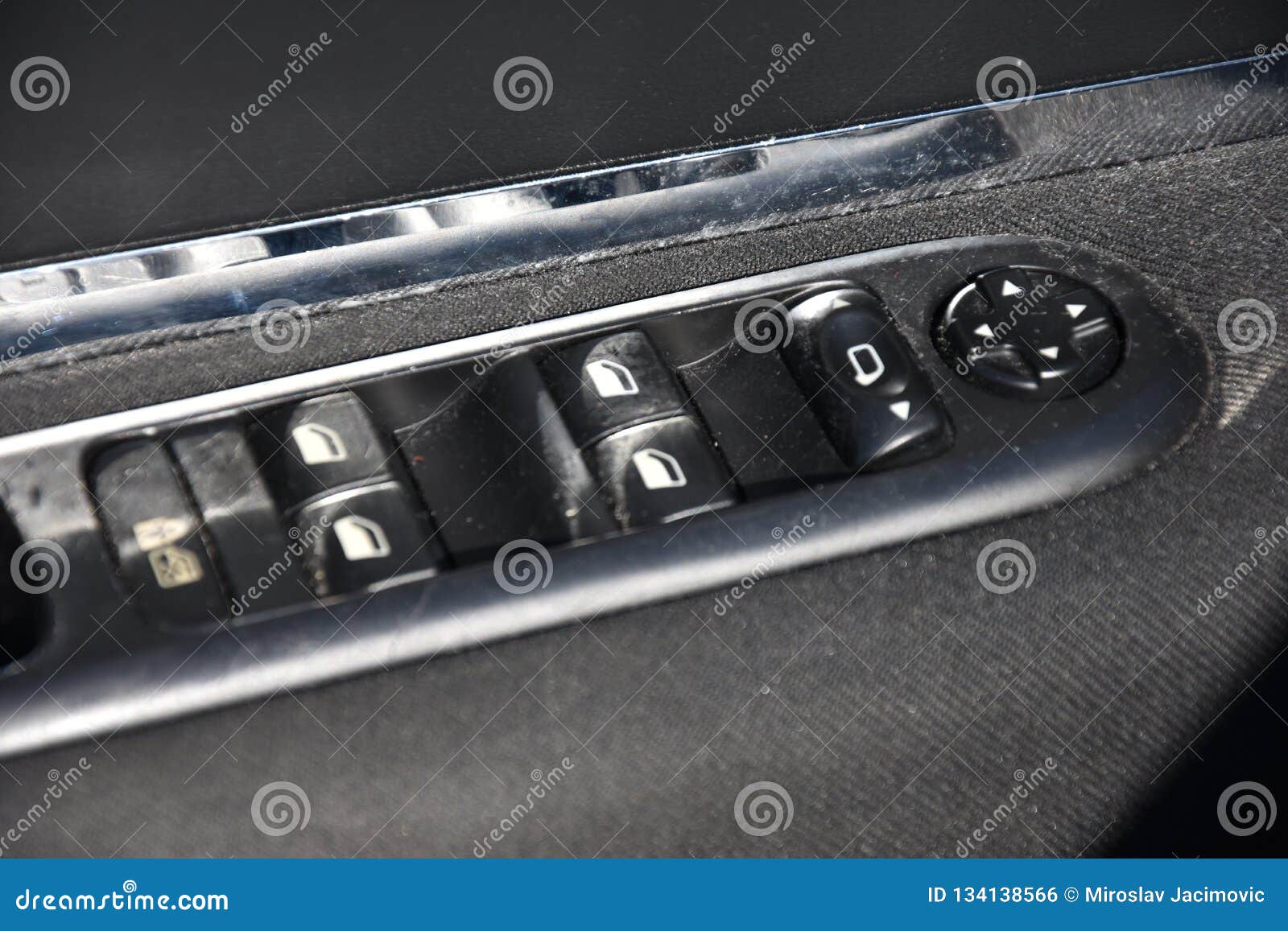Closeup of a Door Control Panel in a Modern Car. Arm Rest with Window ...