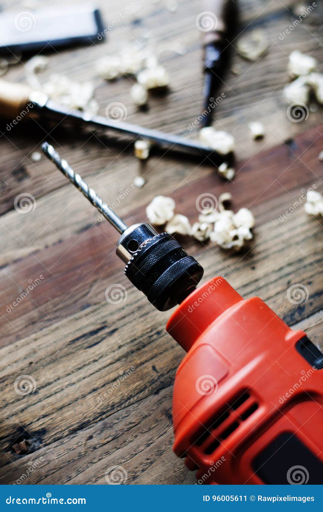 Closeup of Drill on Wooden Table Stock Image - Image of professional ...