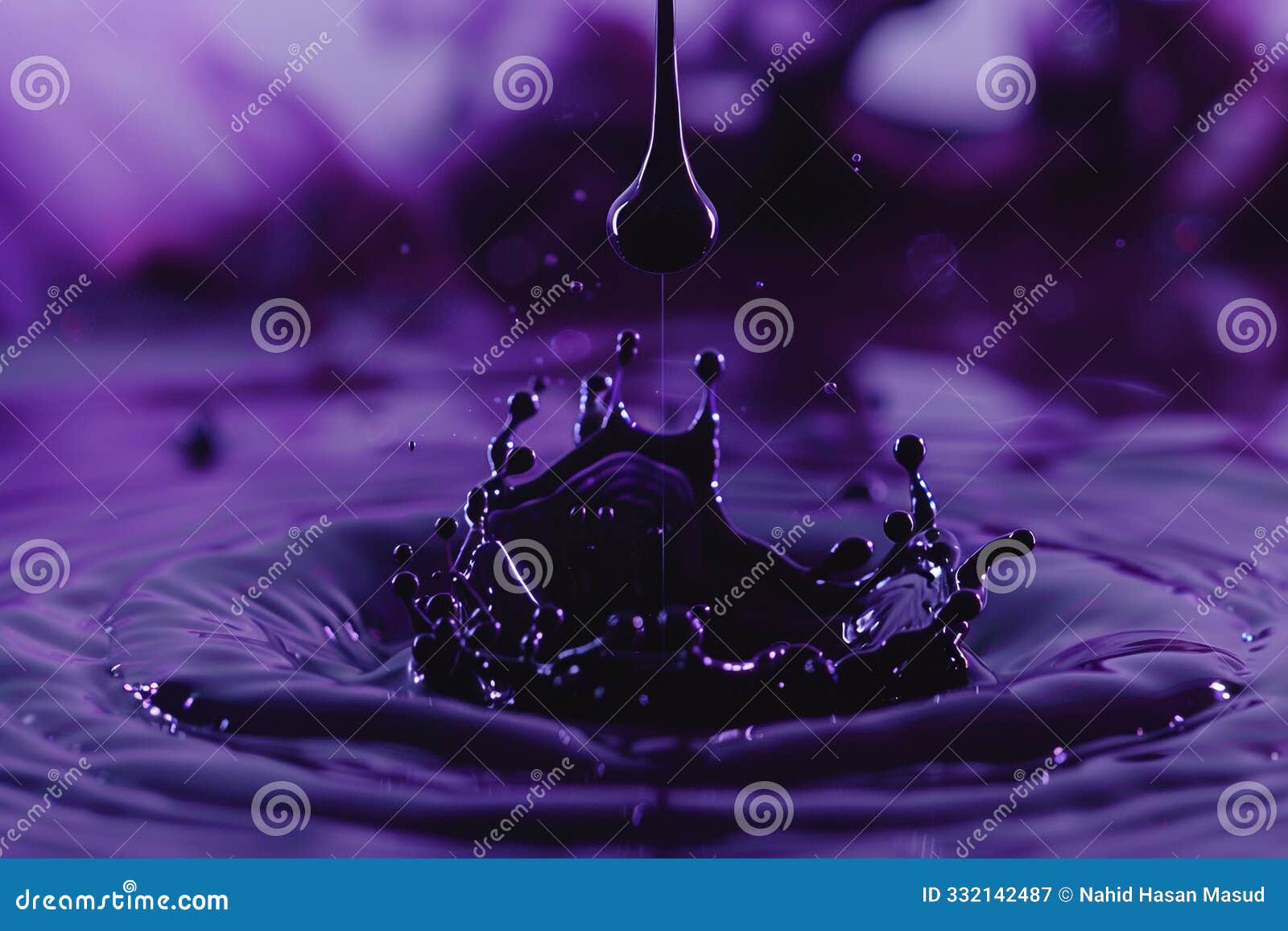 A Closeup on a Droplet of Ink Falling into Water Spreading into Dark ...