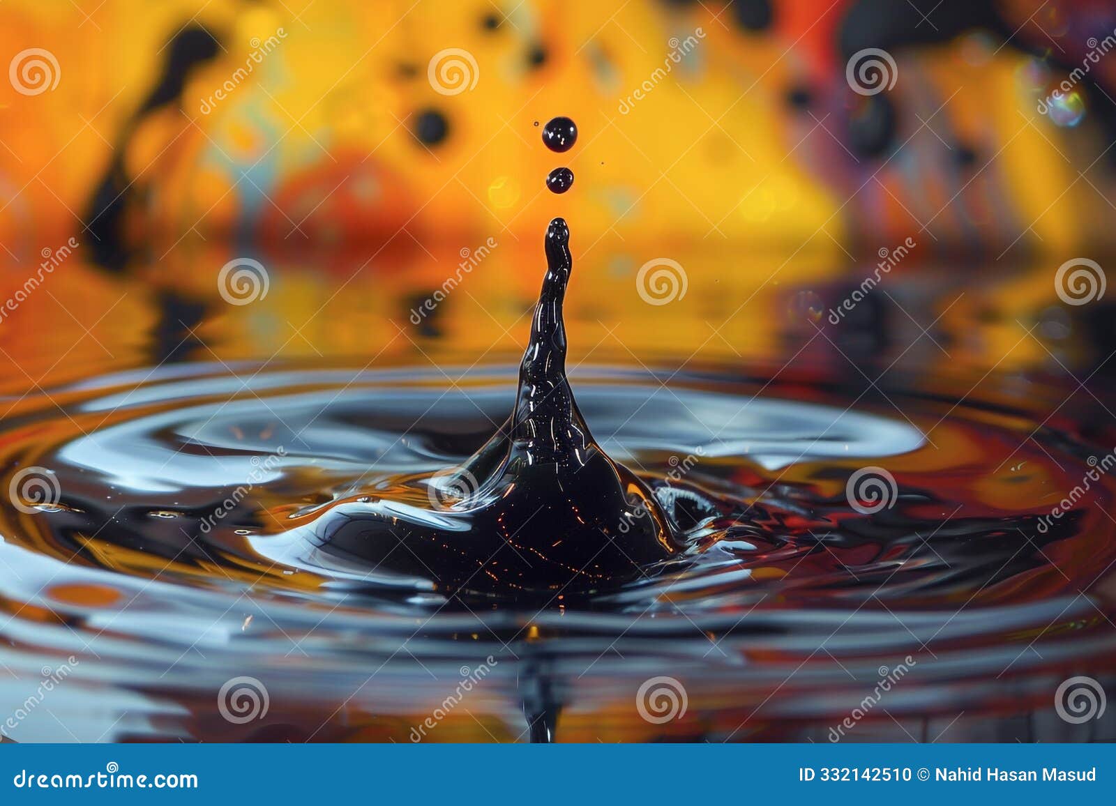 A Closeup on a Droplet of Ink Falling into Water Spreading into Dark ...