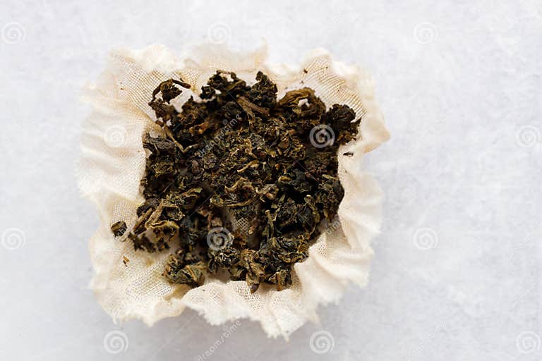 Closeup of Dry Tea Bag on White Table Background Stock Photo - Image of ...