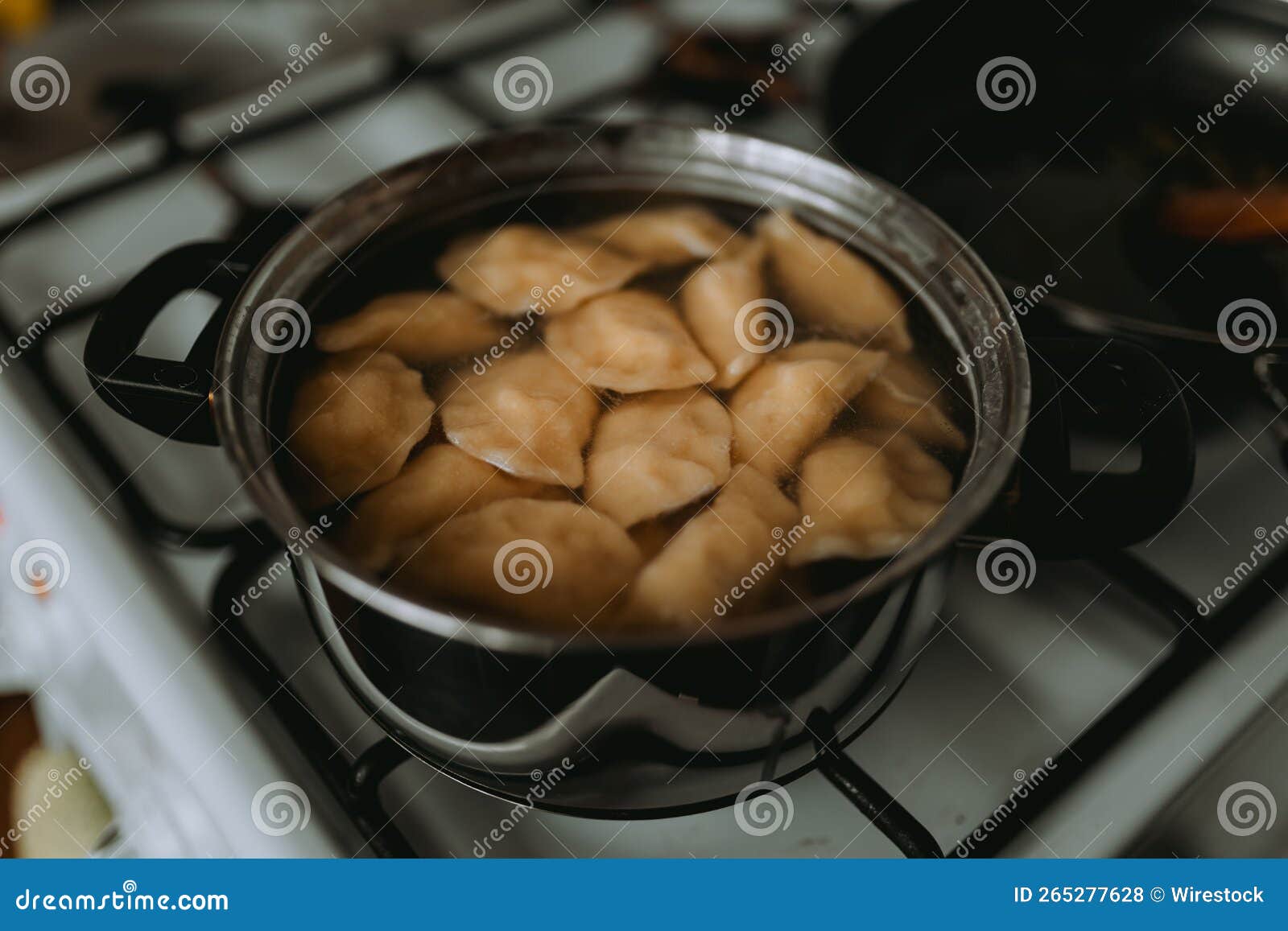 Closeup of Dumplings in a Pot Stock Photo - Image of dinner, cuisine ...