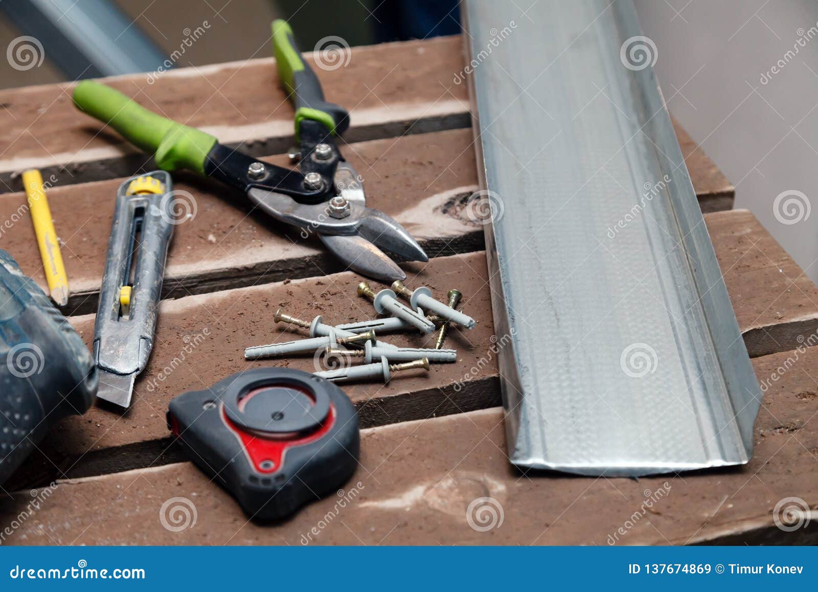 Closeup Dusty Construction Building Tools on the Scaffolding, Puncher ...