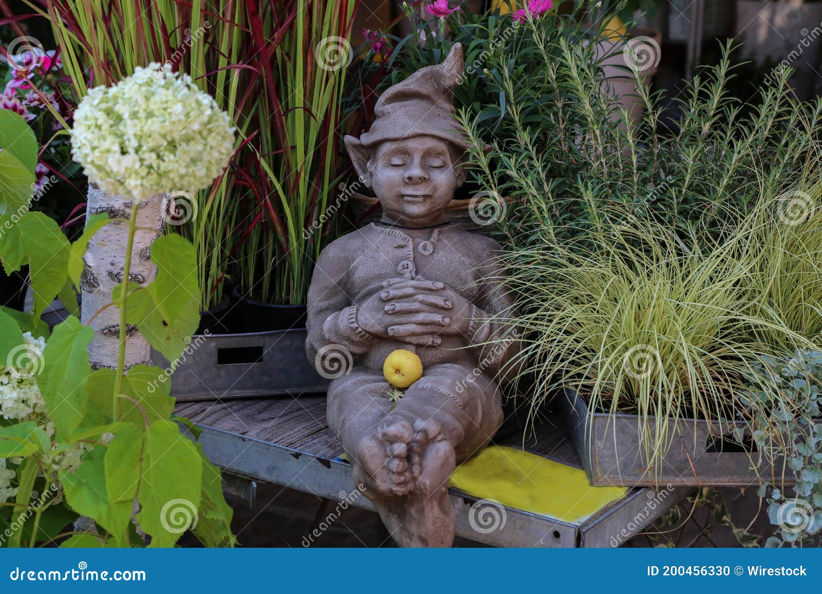 Closeup of a Dwarf Statue in a Sleeping Position Stock Photo - Image of ...