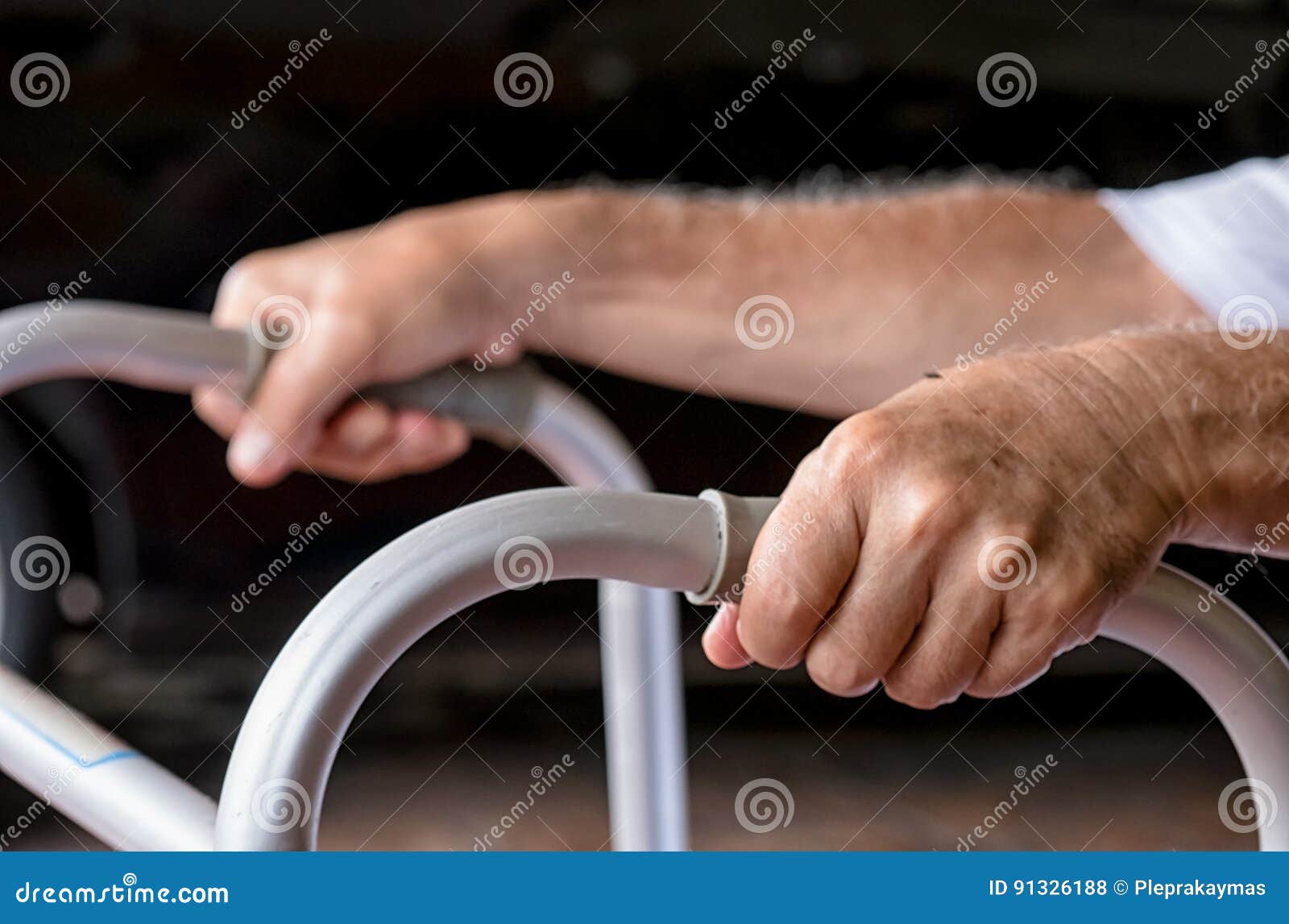 Elderly Hands Holding the Walker Stock Photo - Image of senior, holding ...