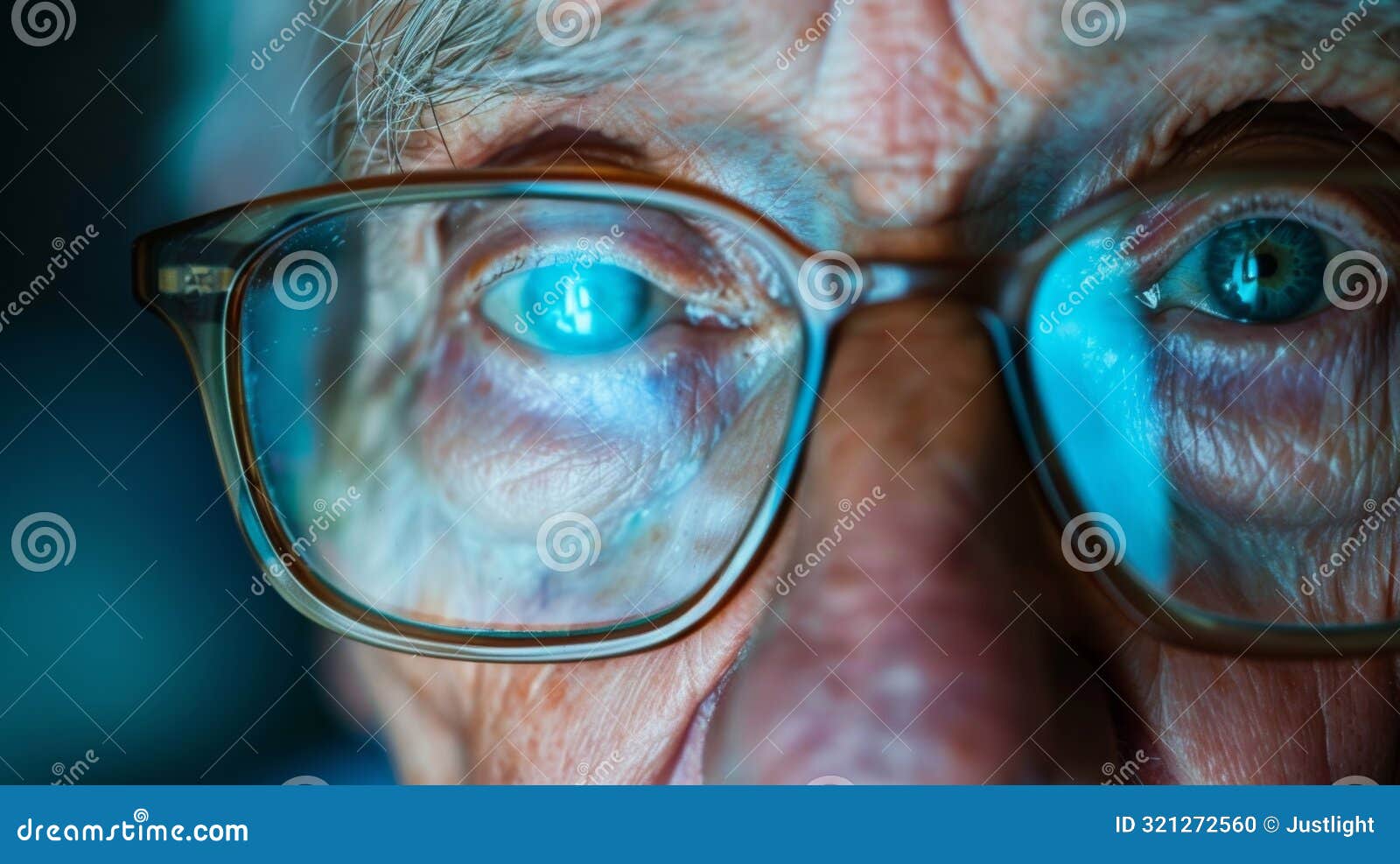 A Closeup of an Elderly Persons Eyes Behind a Pair of Glasses with Blue ...