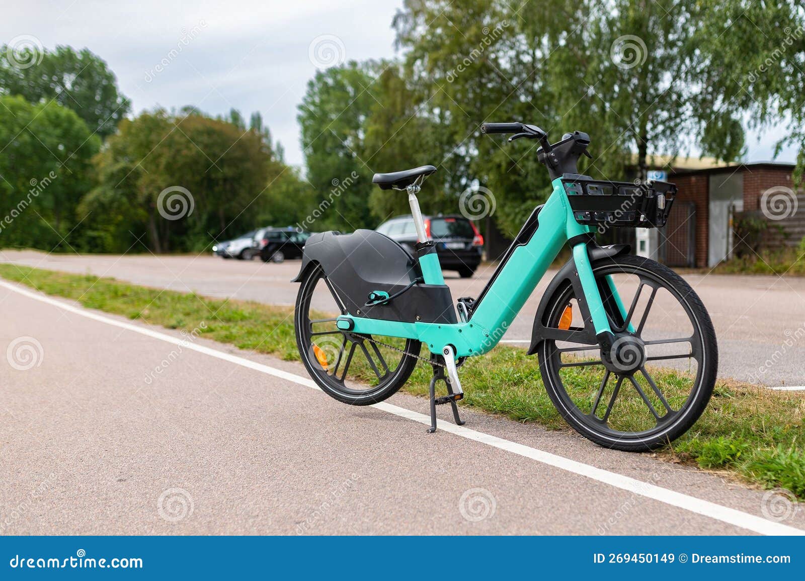 Closeup of an Electric Bike Parked on a Sidewalk Stock Image - Image of ...