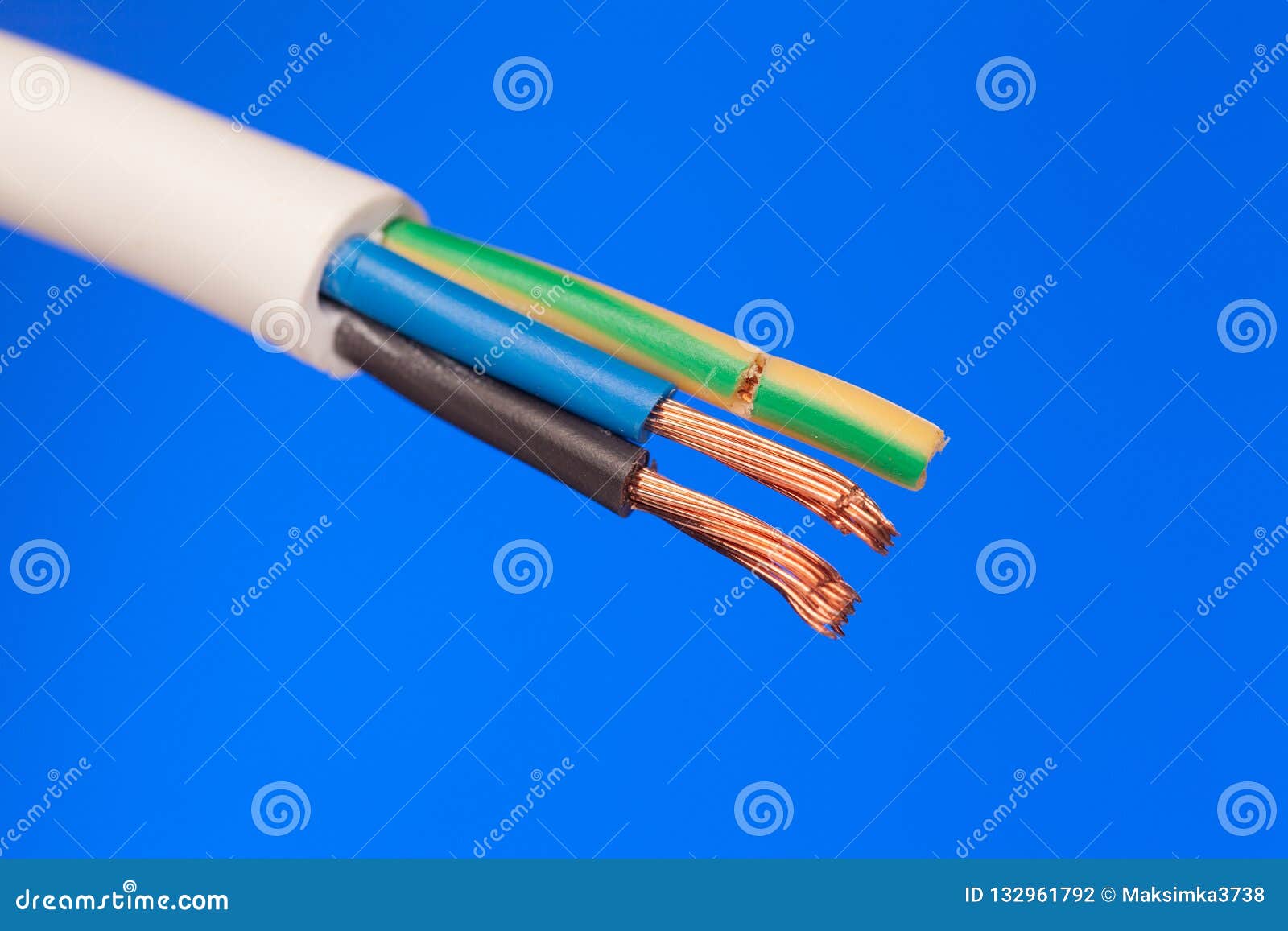 Closeup of a Electric Cable on a Blue Background. Stock Photo - Image ...