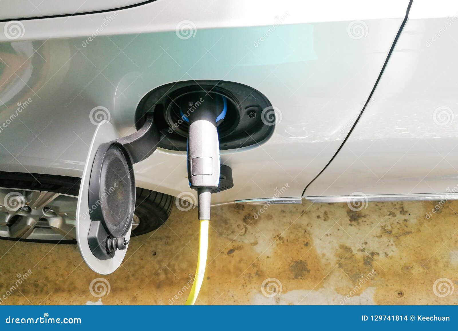 Closeup of Electric Hybrid Car Being Charged with Socket Stock Photo ...