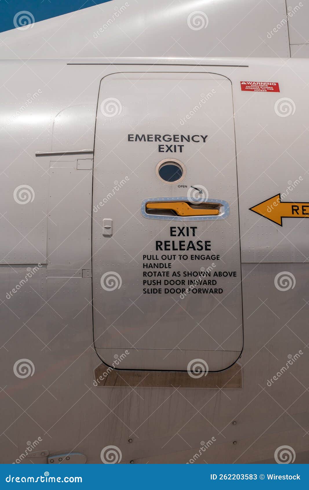 Closeup of an Emergency Exit Hatch on the Outside of a White Aircraft ...