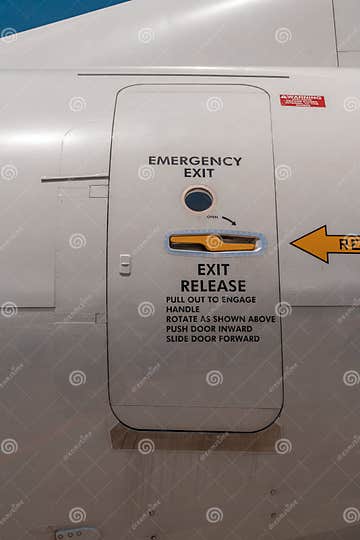 Closeup of an Emergency Exit Hatch on the Outside of a White Aircraft ...
